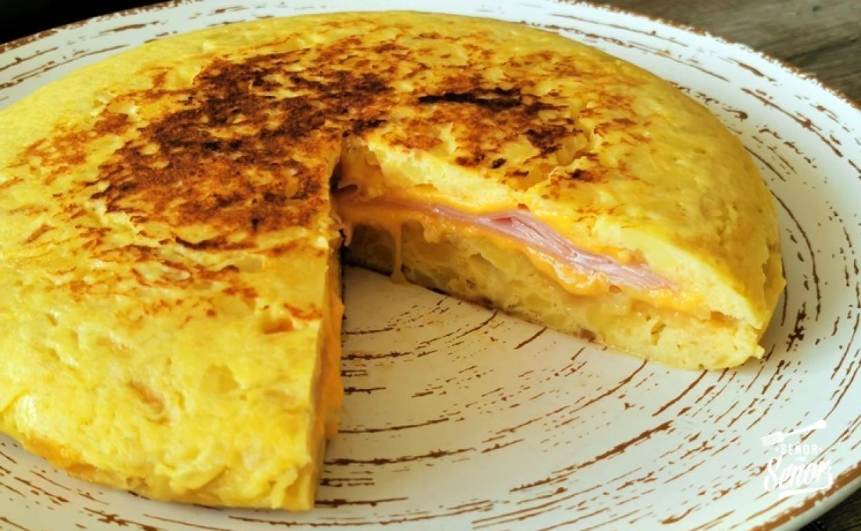Receta de tortilla de patatas rellena de jamón y queso | El Norte de ...