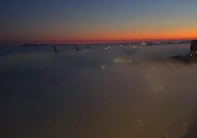 The Gran Sol Skyscraper Emerges Above a Sea of Clouds Following Fog ...